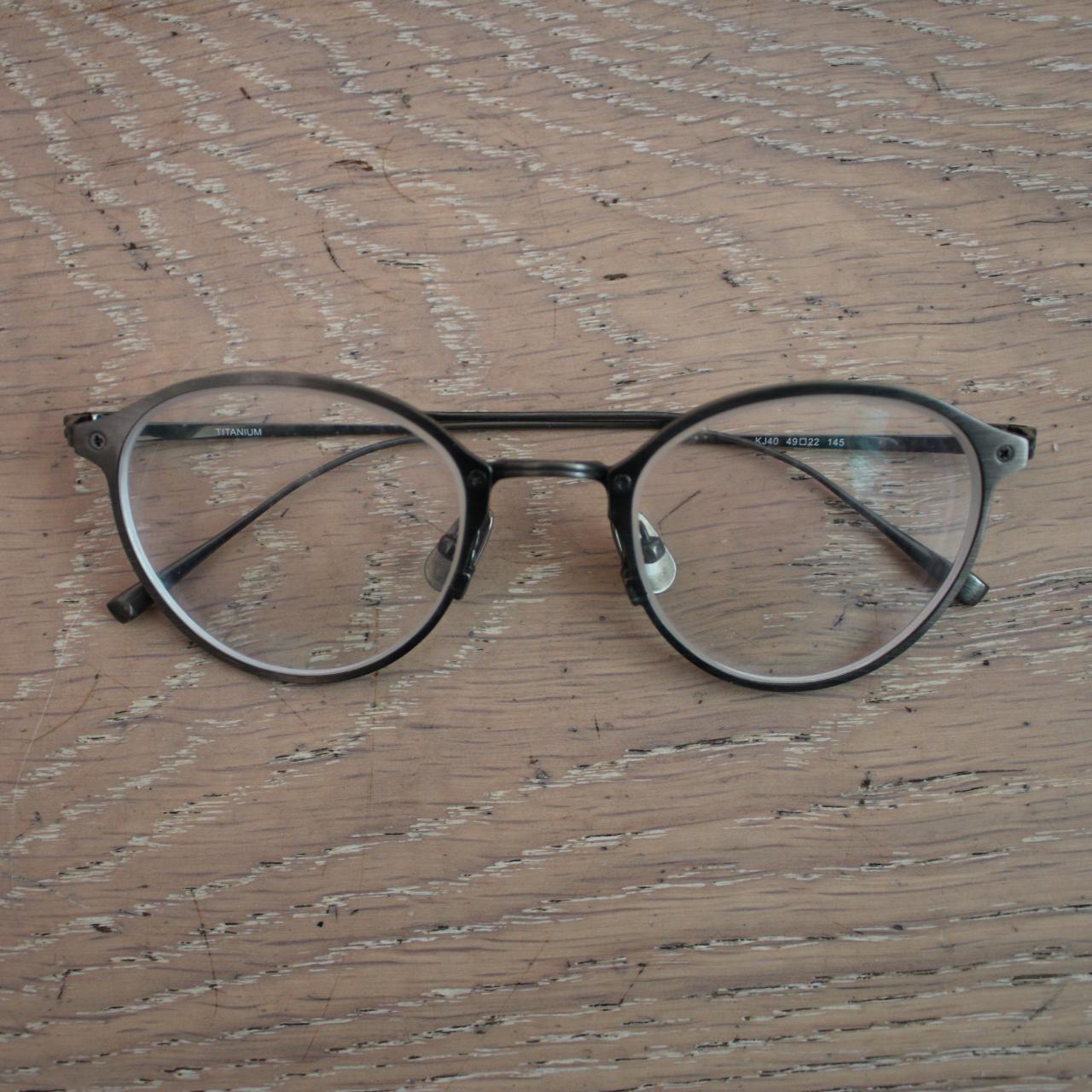 gunmetal round titanium frames excellent... - Depop