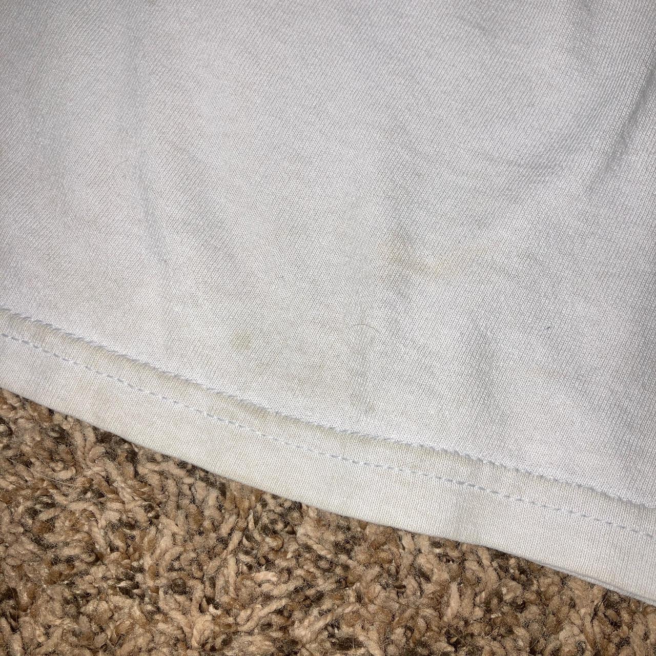 All white vintage tee 100% cotton, it has one little... - Depop