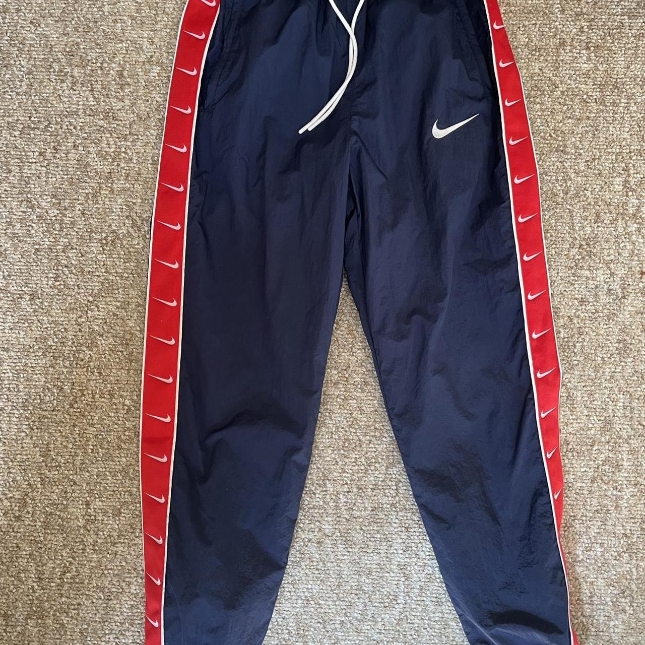 Blue and red Nike track pants Only worn a couple... - Depop