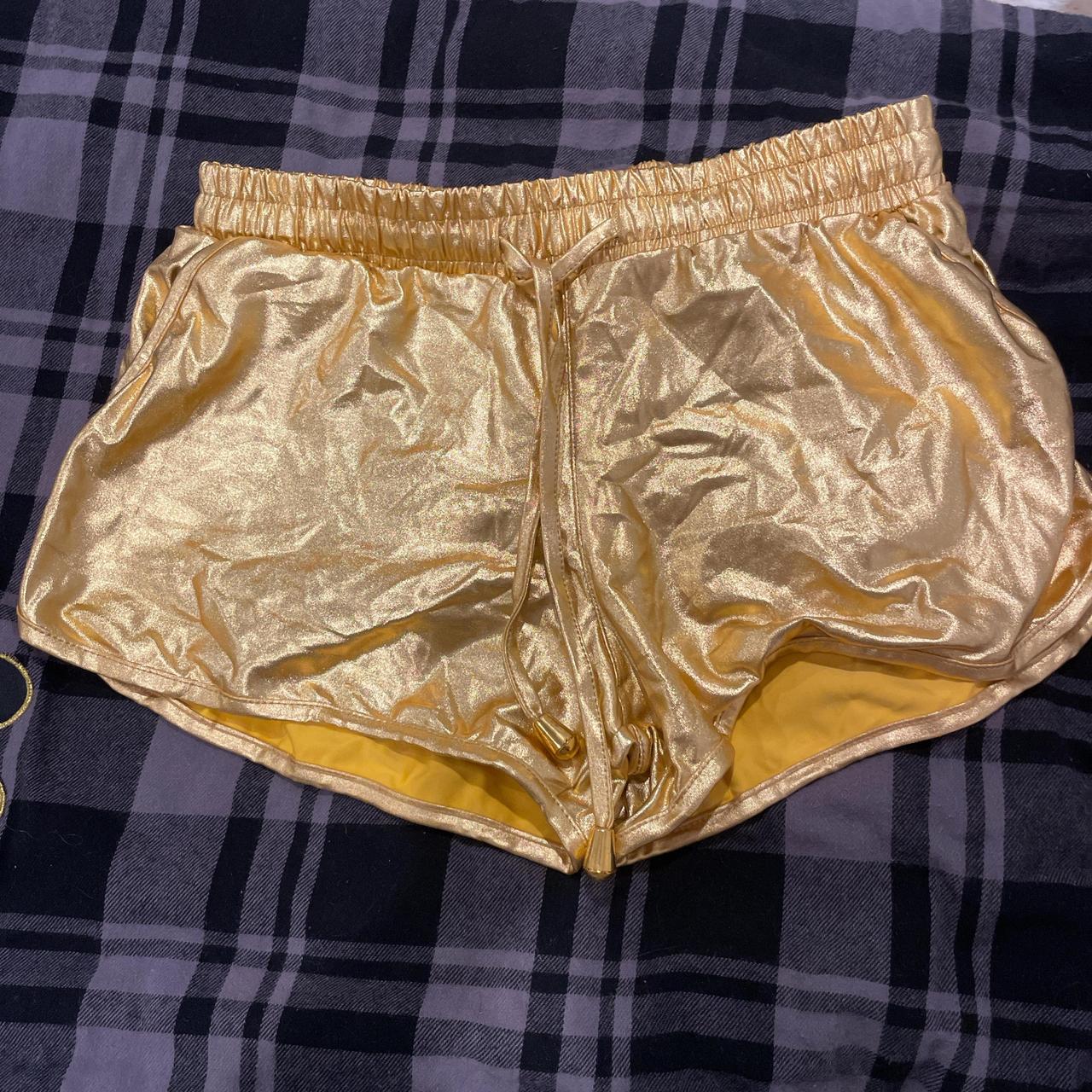 Gold metallic shorts with elastic waist and... - Depop
