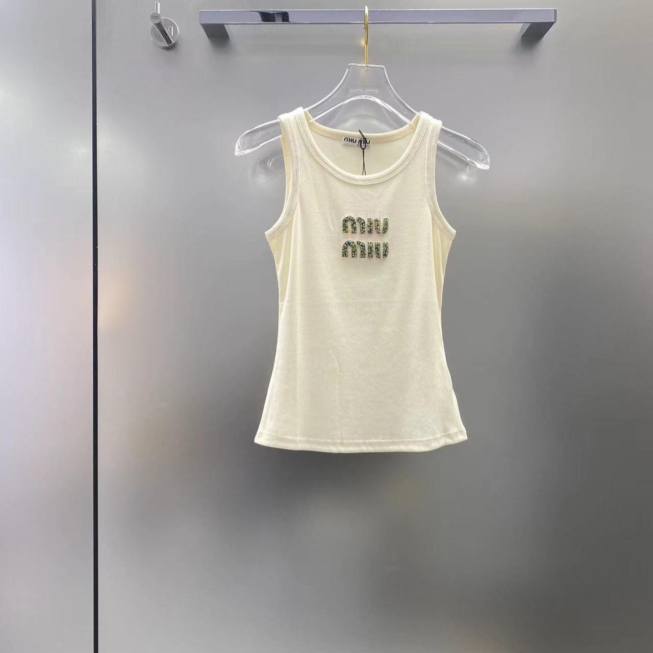 Miu Miu Athleisure Apricot Women's Tank Top Brand... - Depop