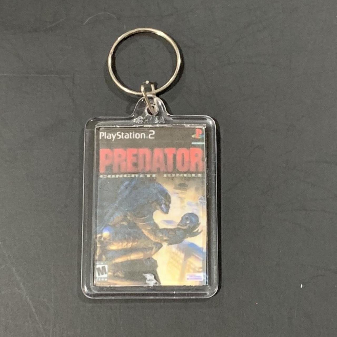 PS2 Predator Concrete Jungle Keychain... - Depop