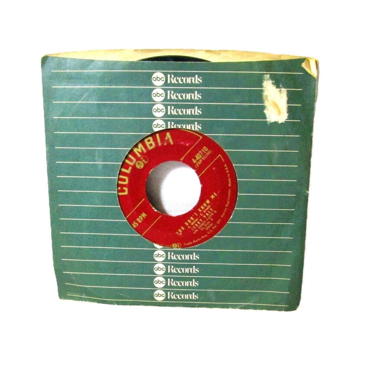 This 45 RPM vinyl record from Columbia contains two... - Depop