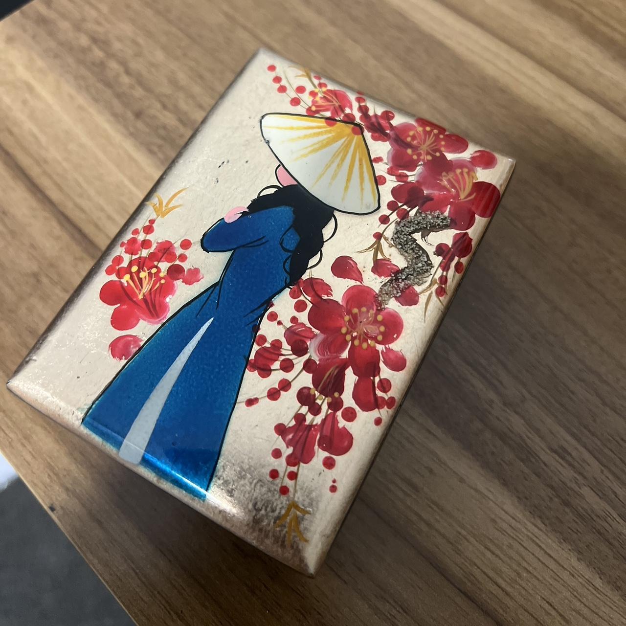 Red and black Vietnamese box with a unique design,... | Depop