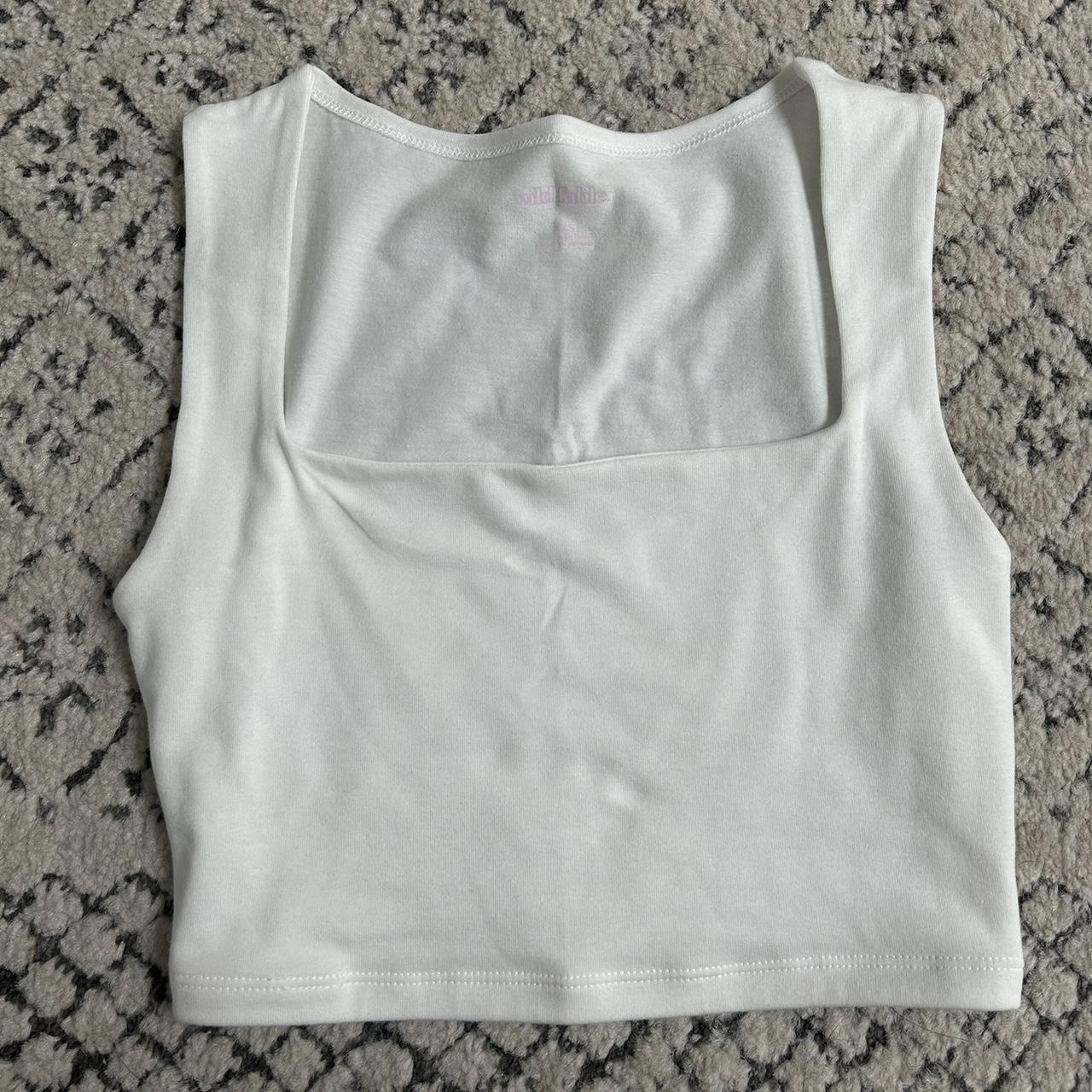 White crop top. Has an extra layer of fabric in the... - Depop