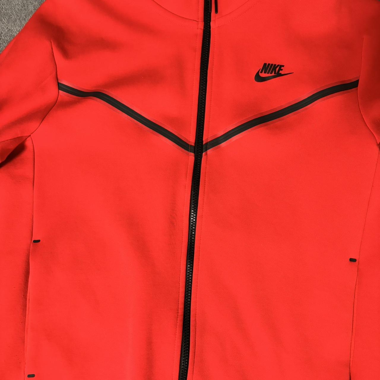 Medium red nike tech in pretty good condition. Well... - Depop