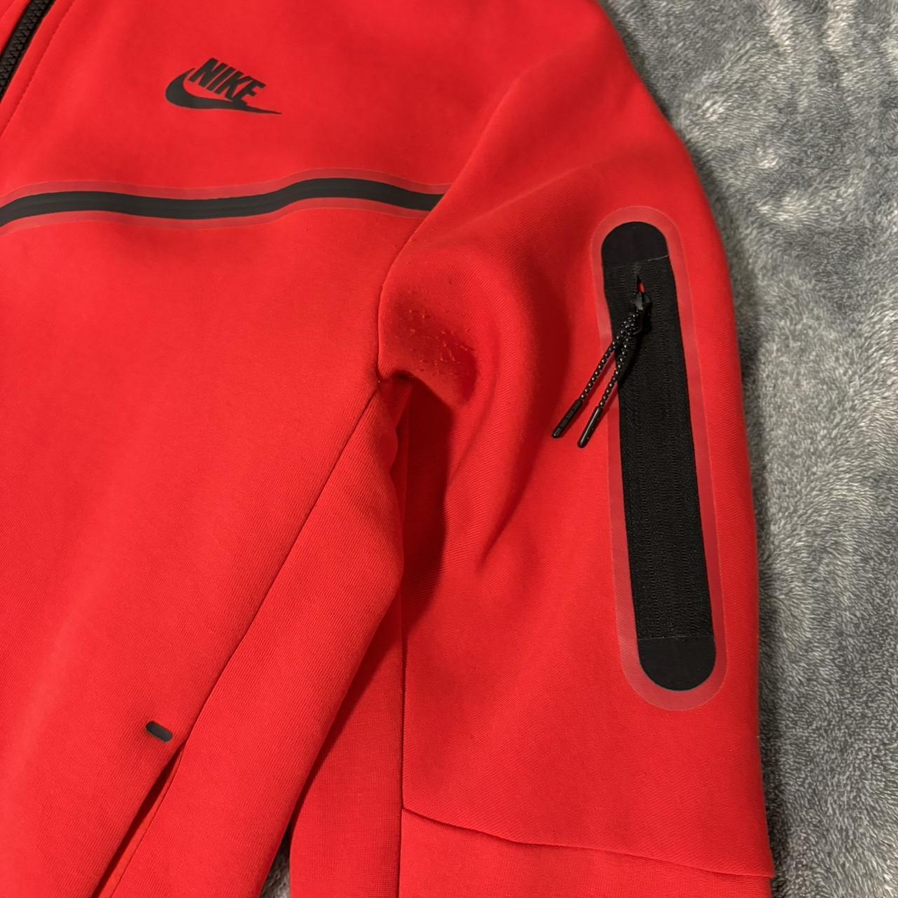 Medium red nike tech in pretty good condition. Well... - Depop