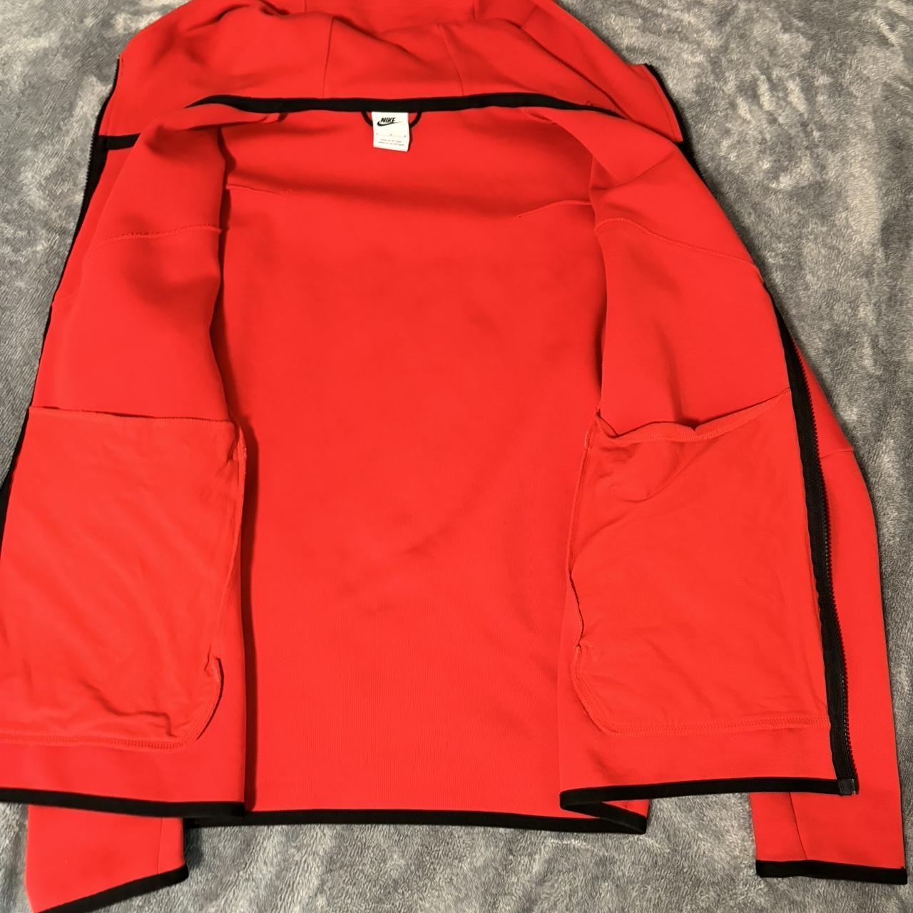 Medium red nike tech in pretty good condition. Well... - Depop