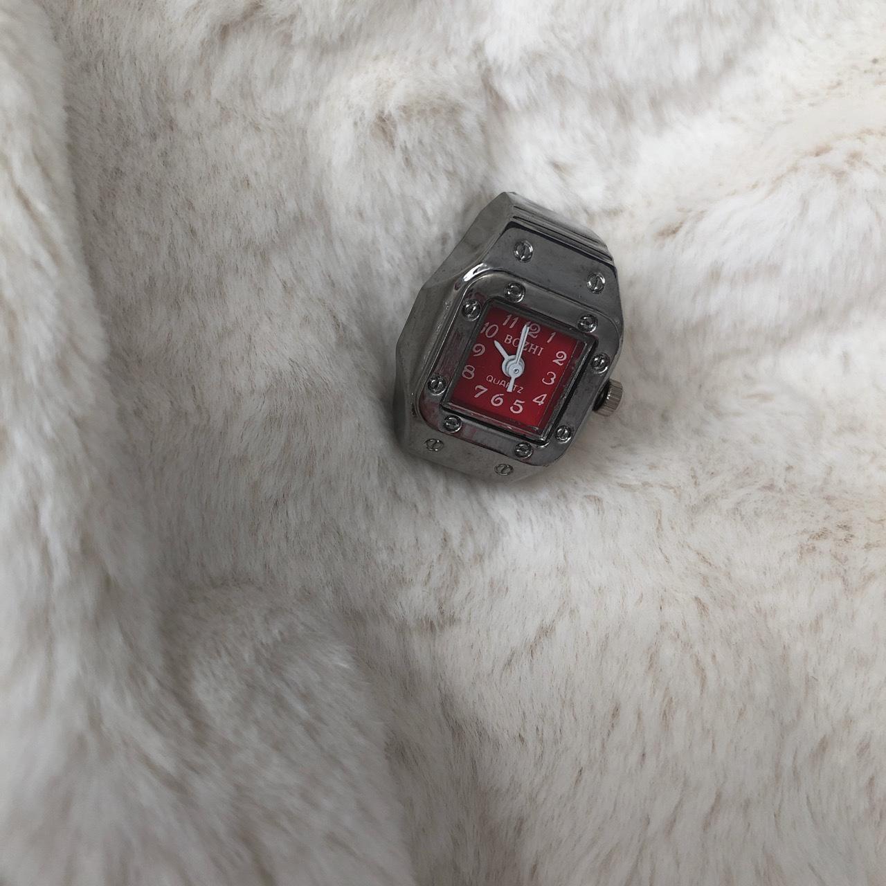 Working clock ring. New condition as never used. Red... - Depop