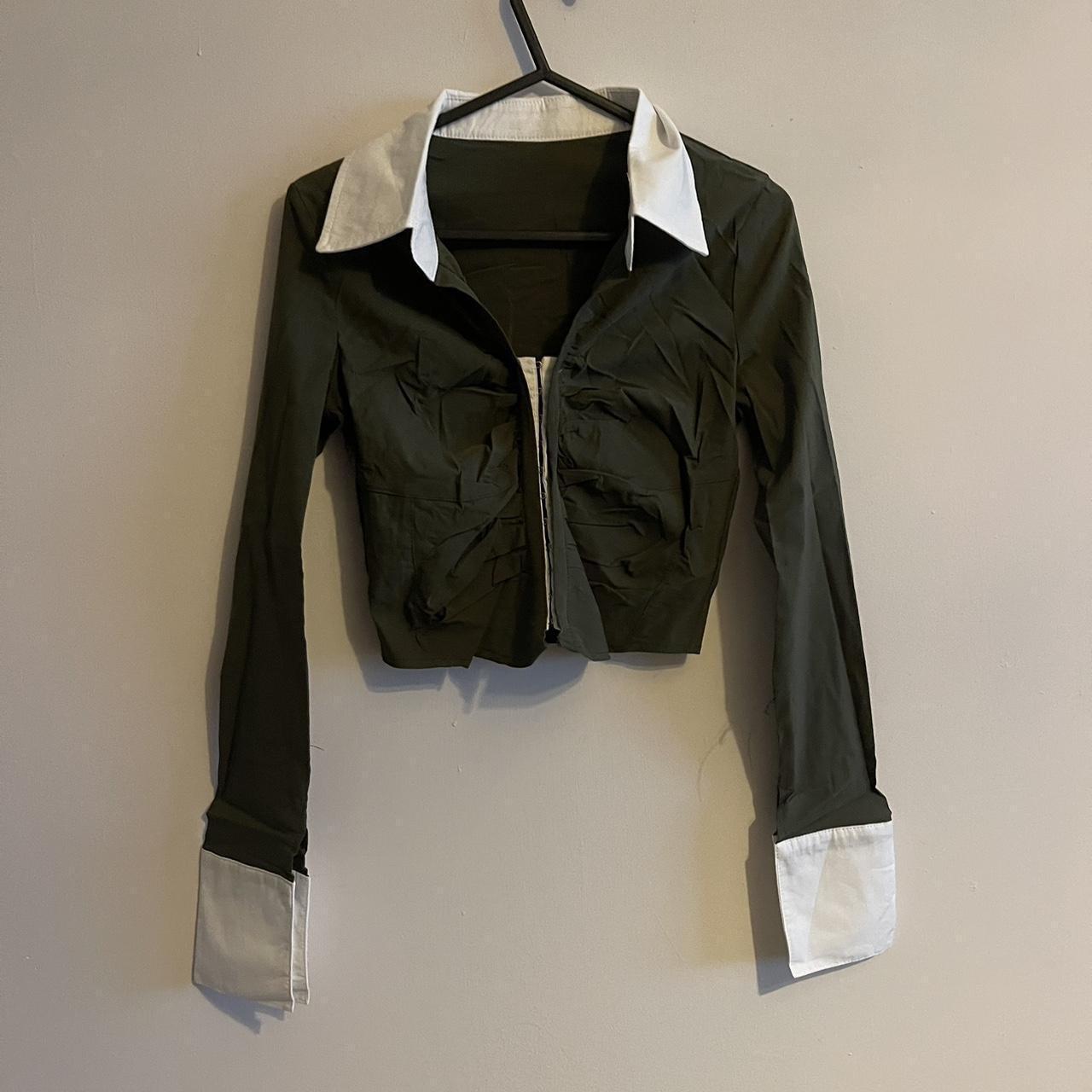 Khaki green shirt. Clasp close. Low cut collared... - Depop