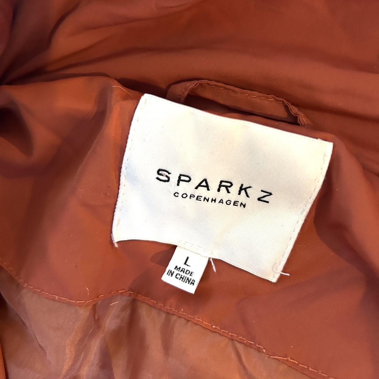 Rust colored puffer jacket Brand is Sparkz... | Depop