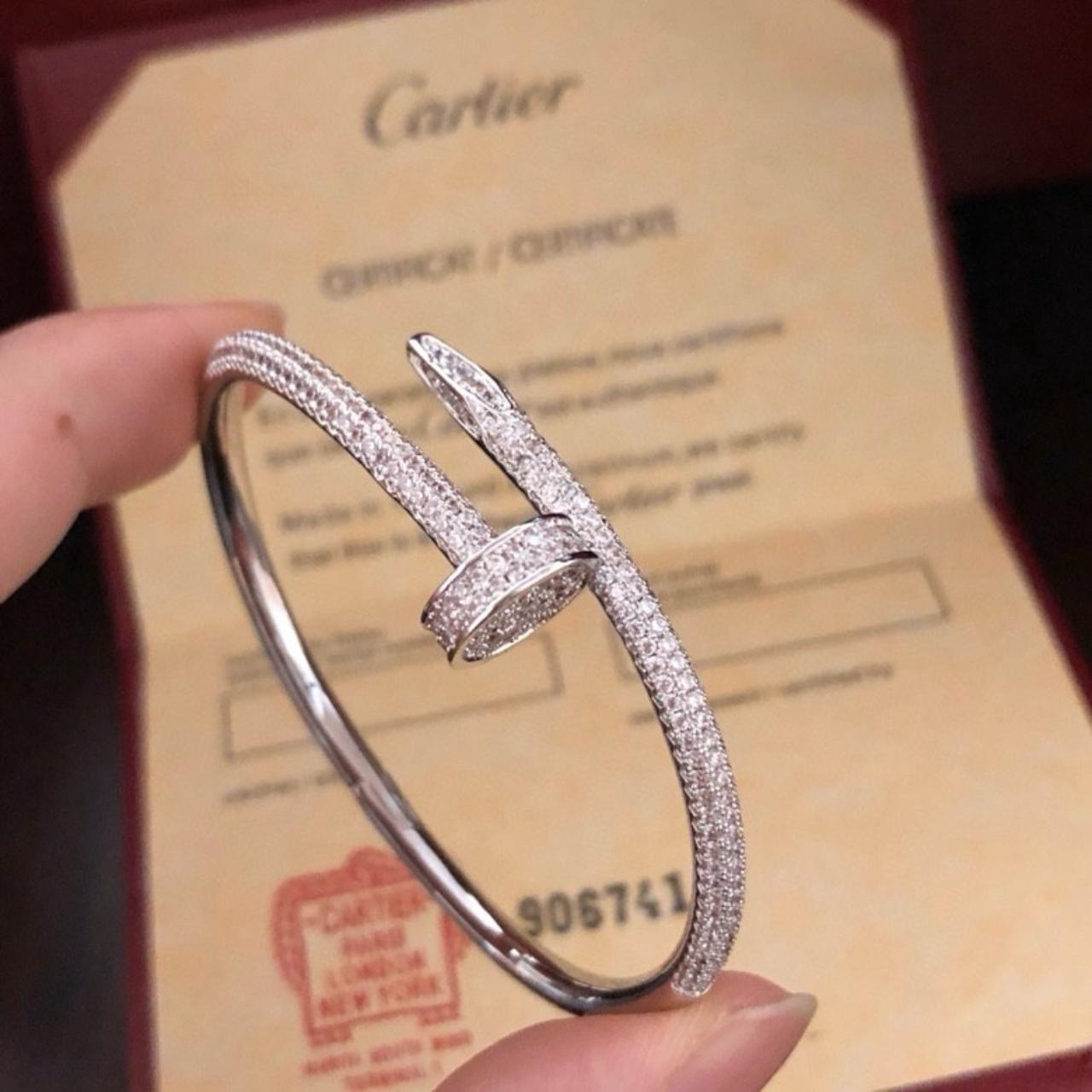 Cartier half circle full of diamond nail bracelet,... - Depop