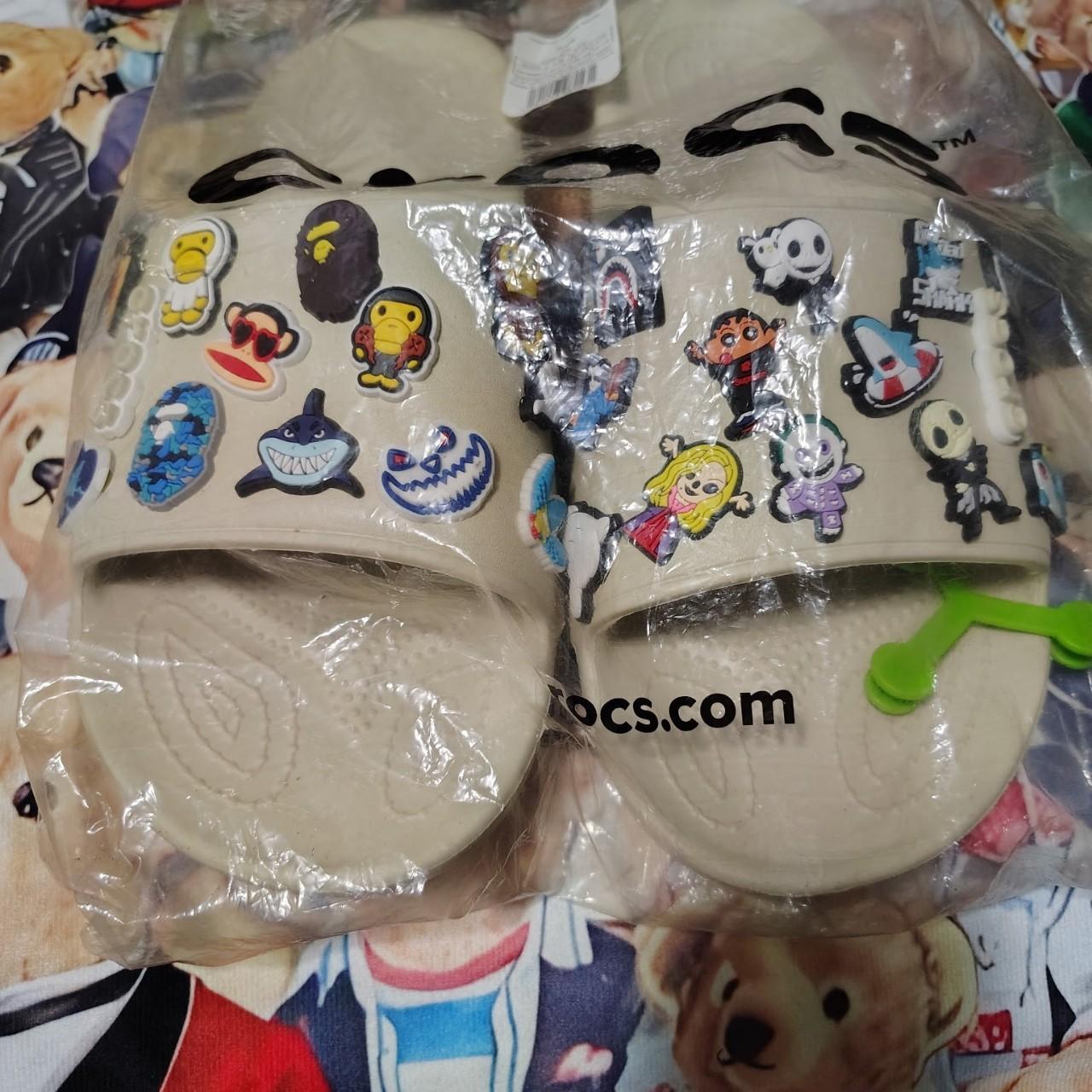 bone color and multi-coloured Crocs x Uniqlo slides... | Depop