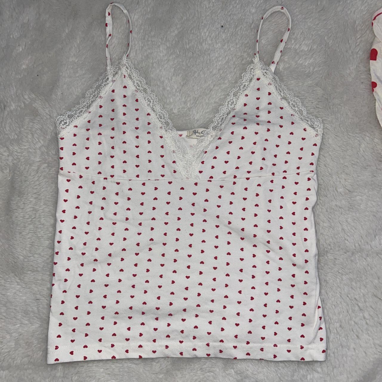 rare brandy melville heart tank. never worn.... - Depop