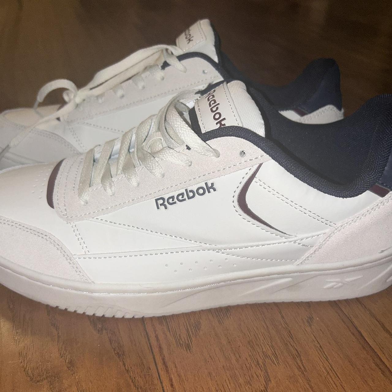 White Reebok trainers with navy and maroon. only... - Depop