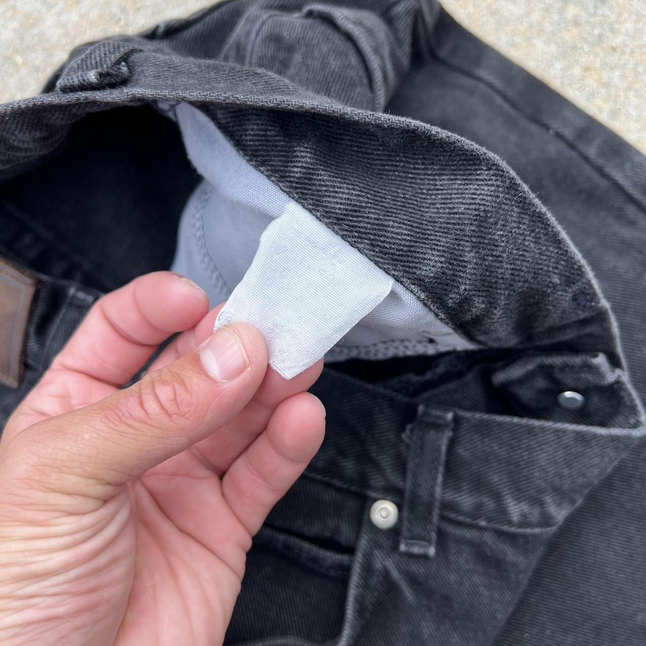 black baggy jeans nfl branding 38x32 #baggyjeans... - Depop