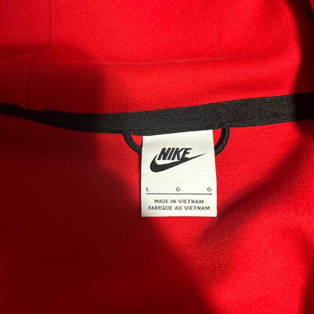 Red Nike tech jacket size large Sleeve zipper is a... - Depop