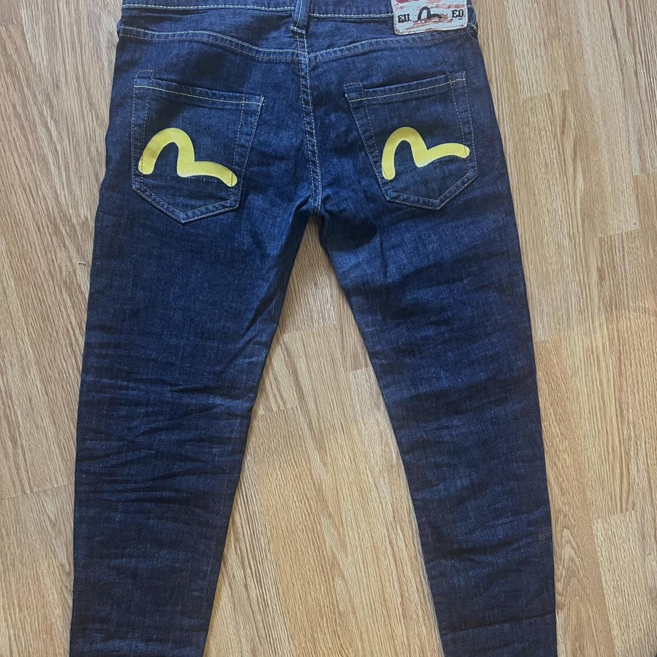 Straight leg low waist Evisu Jeans with yellow back... - Depop