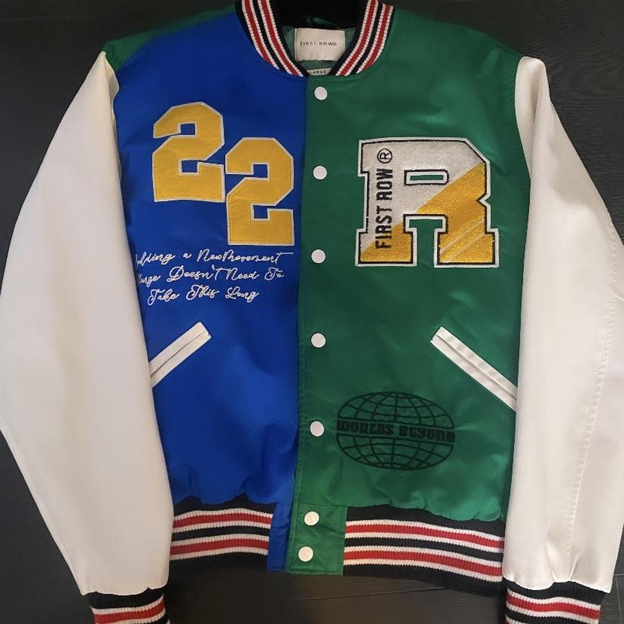 first row varsity jacket size large ships within... - Depop