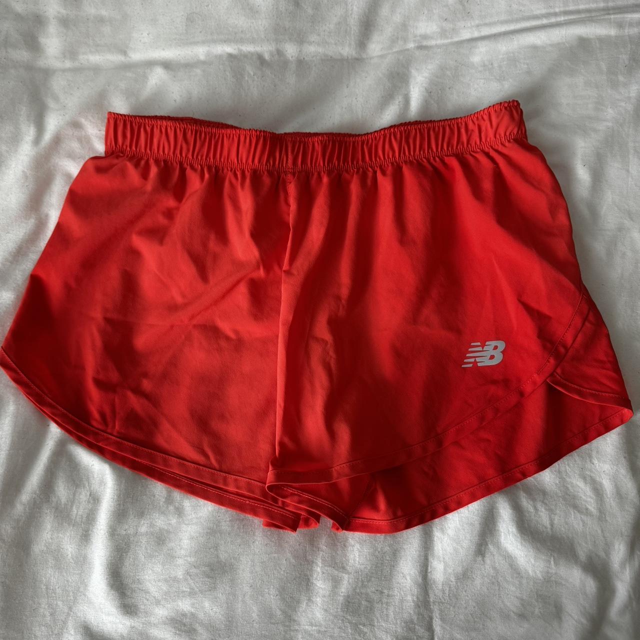 New Balance orange running shorts - Depop