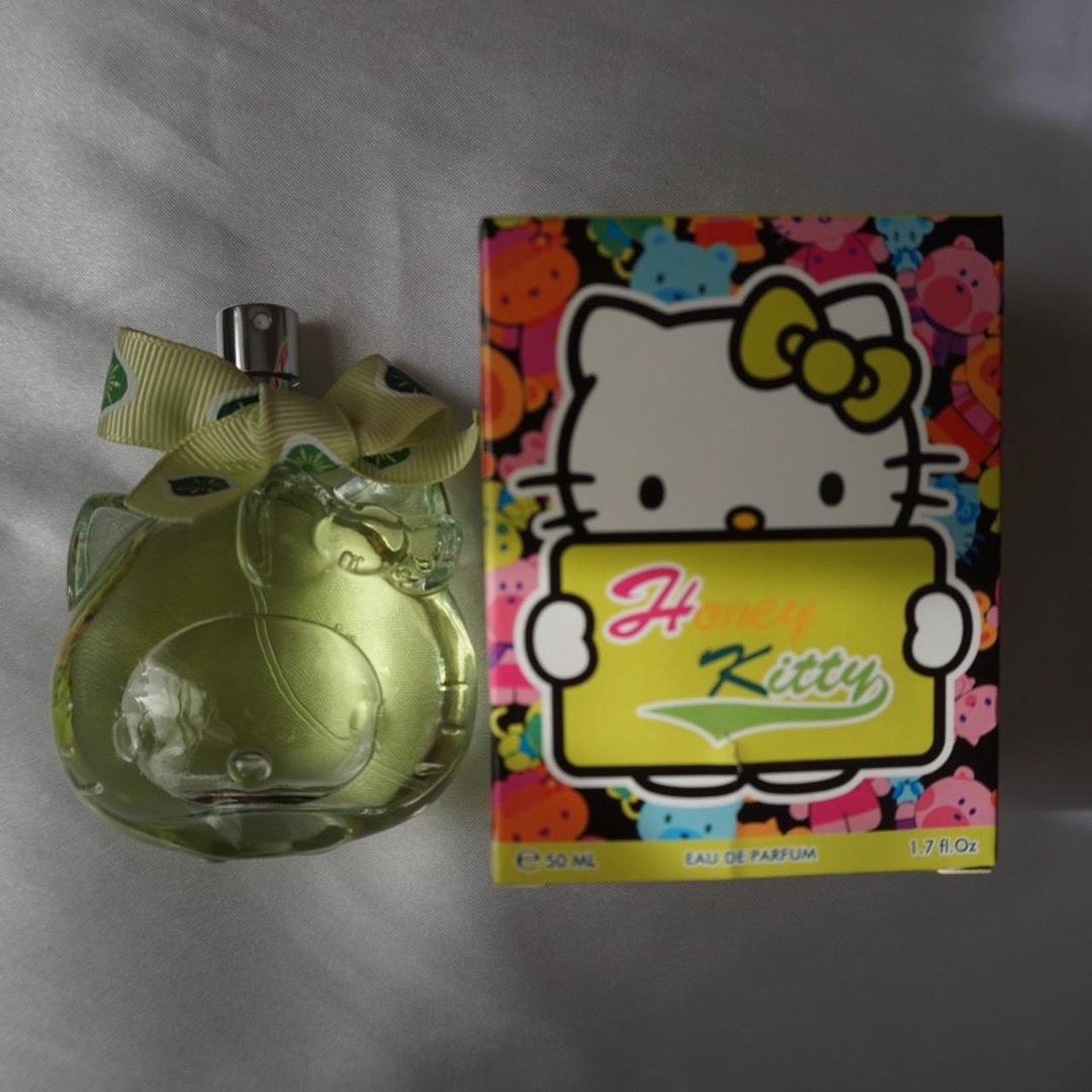 Hello Kitty green perfume body oil... - Depop