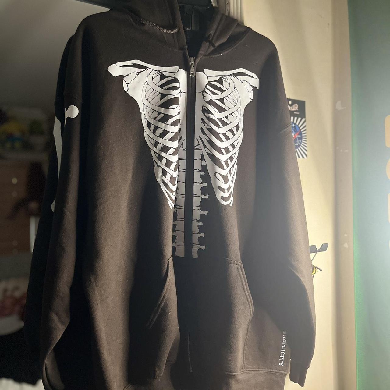 Skull zip up hoodie size XL Runs oversize Brown... - Depop