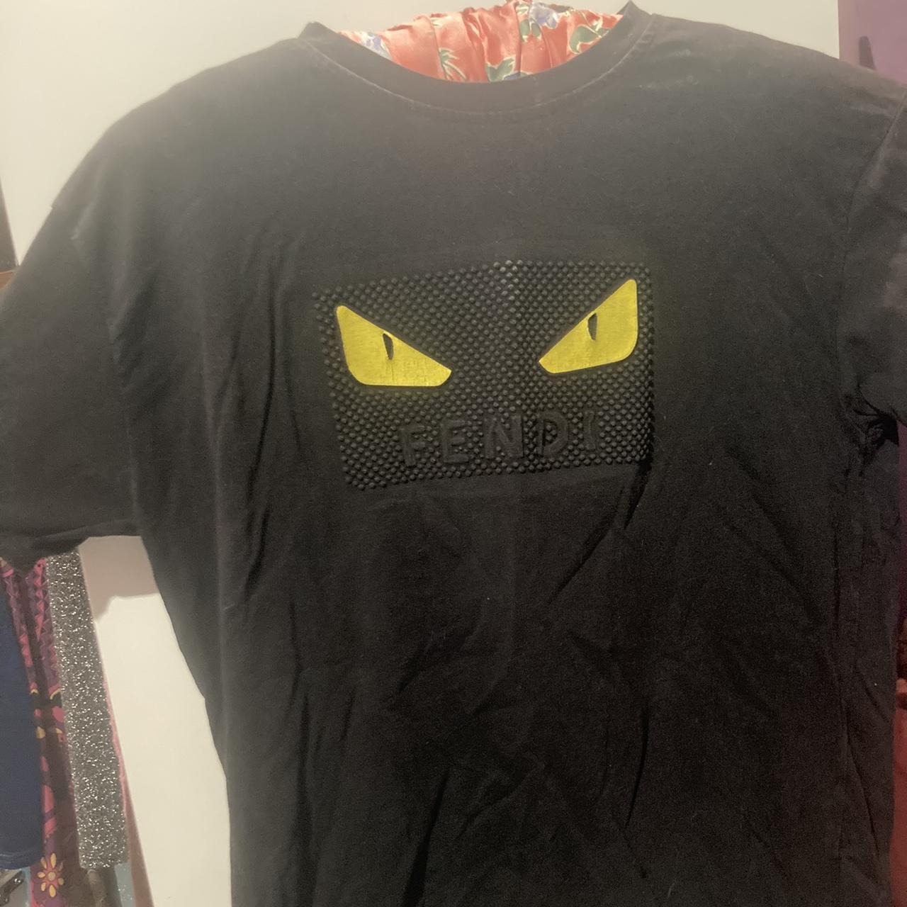Fendi cat eye t shirt good condition, some wear as... - Depop