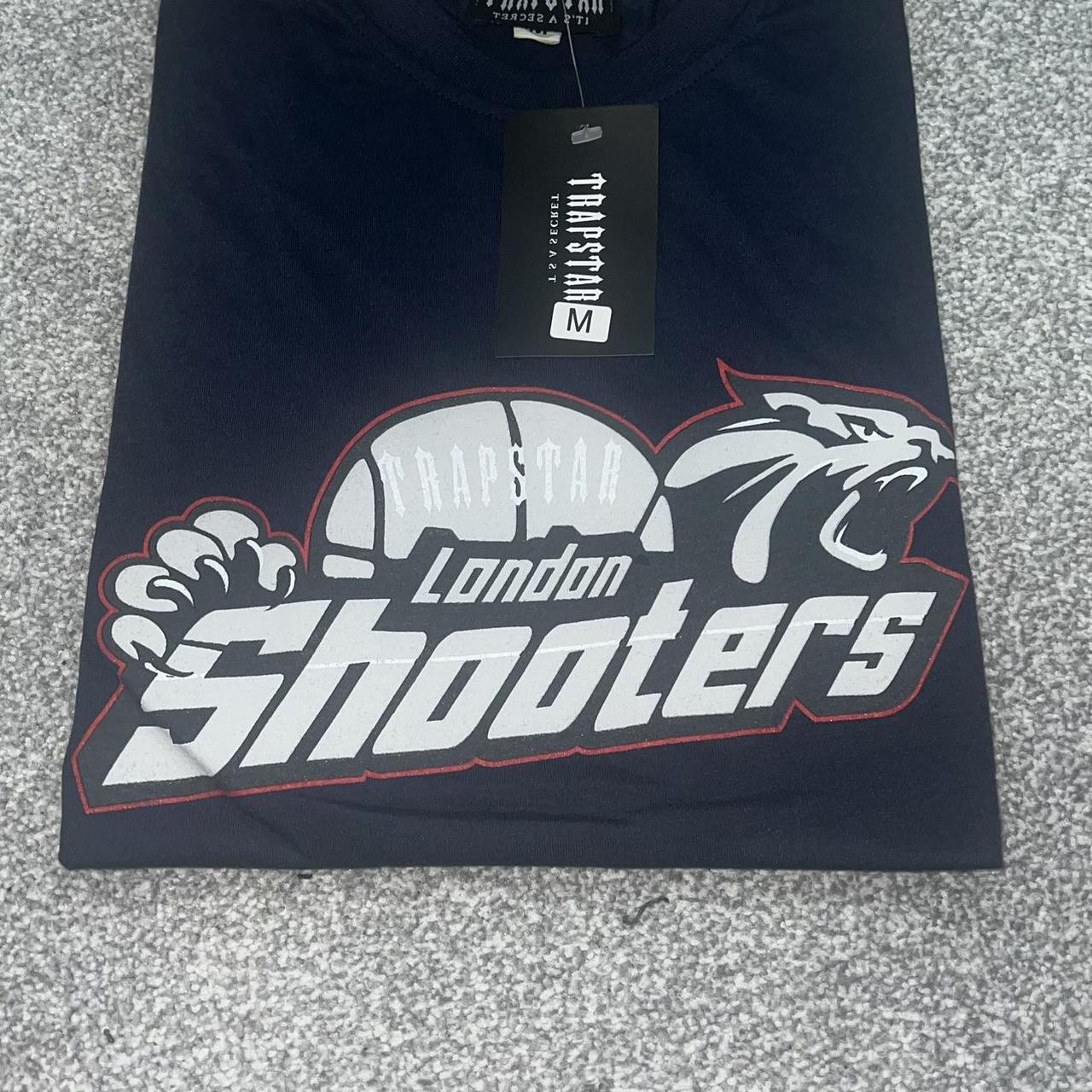 Trapstar shooters tshirt in navy blue size M - Depop