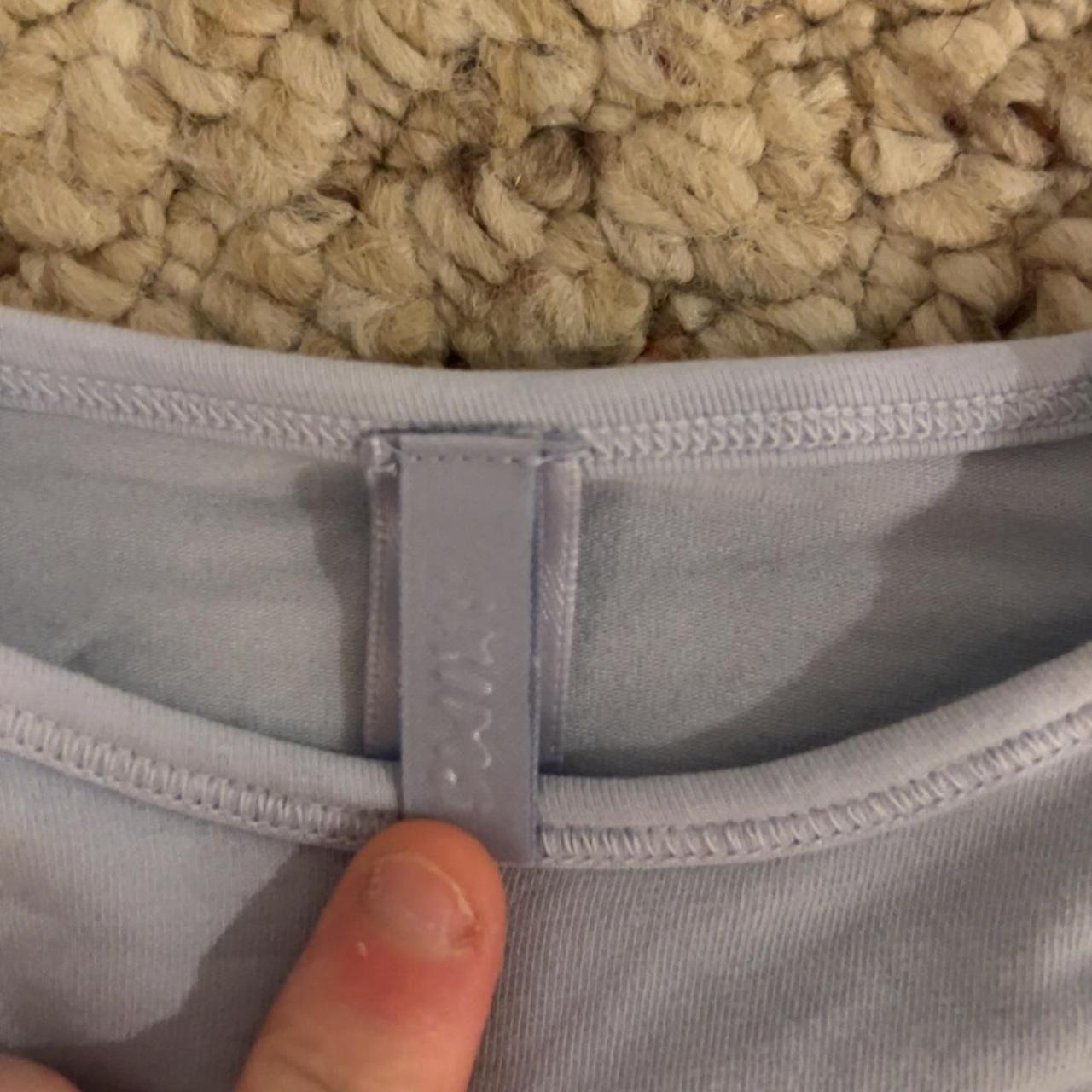 skims blue shirt worn once - Depop