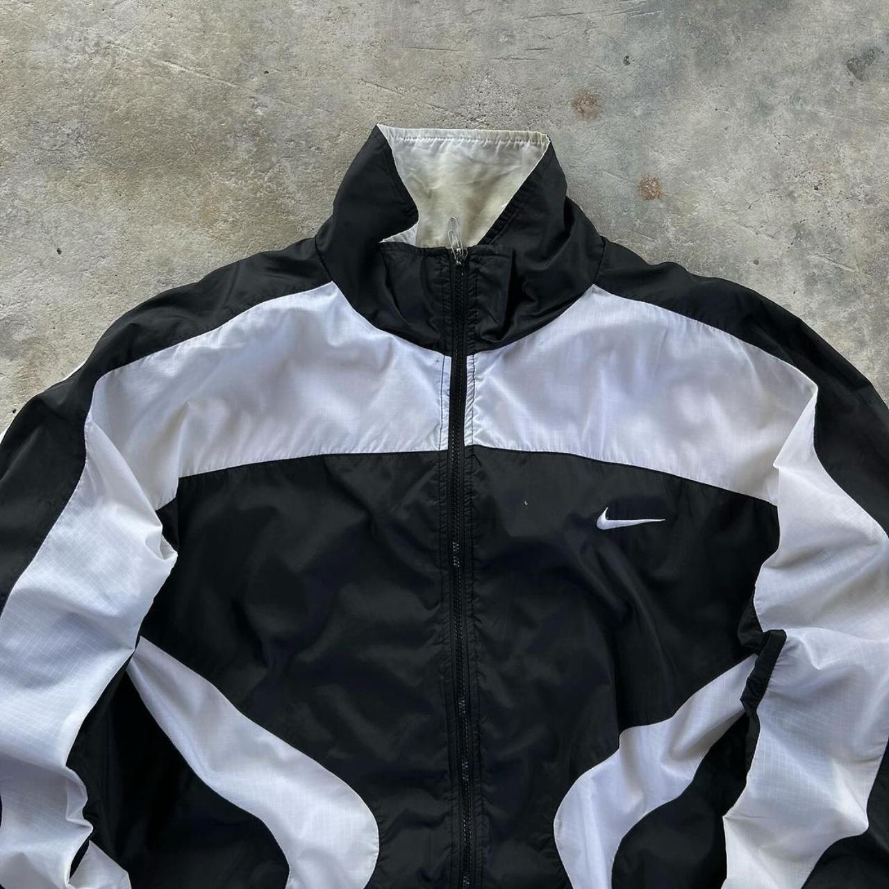 Nike mini swoosh windbreaker jacket Used Size -... - Depop