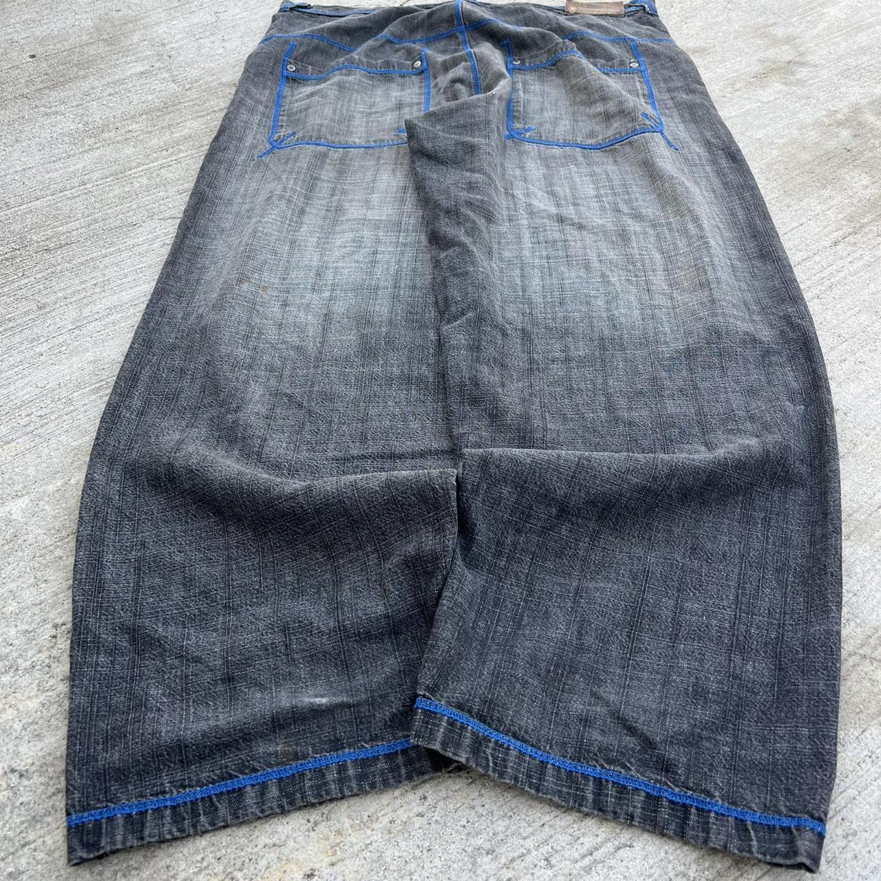 Vintage evolution jeans from the 2000s flaws shown... - Depop