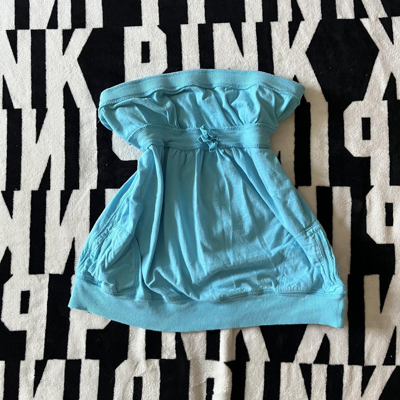 super cute y2k light blue top. has cute pockets on... | Depop