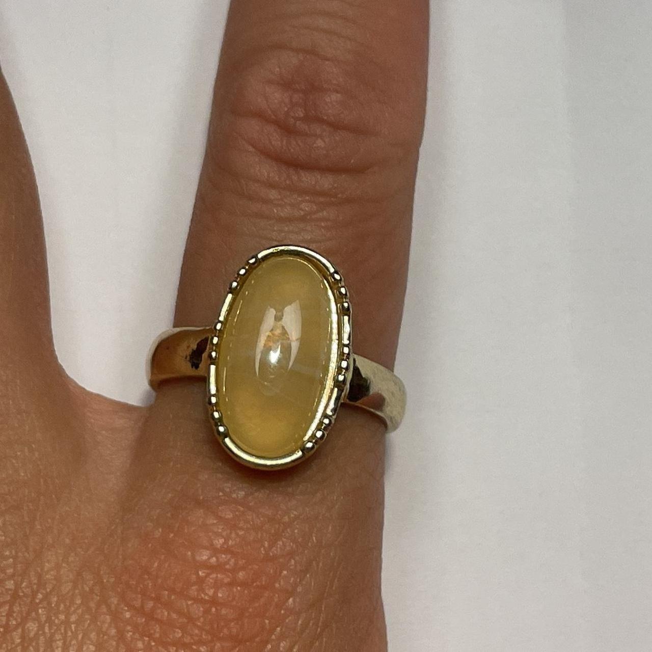 Stunning gold tone ring with a beautiful yellow... - Depop