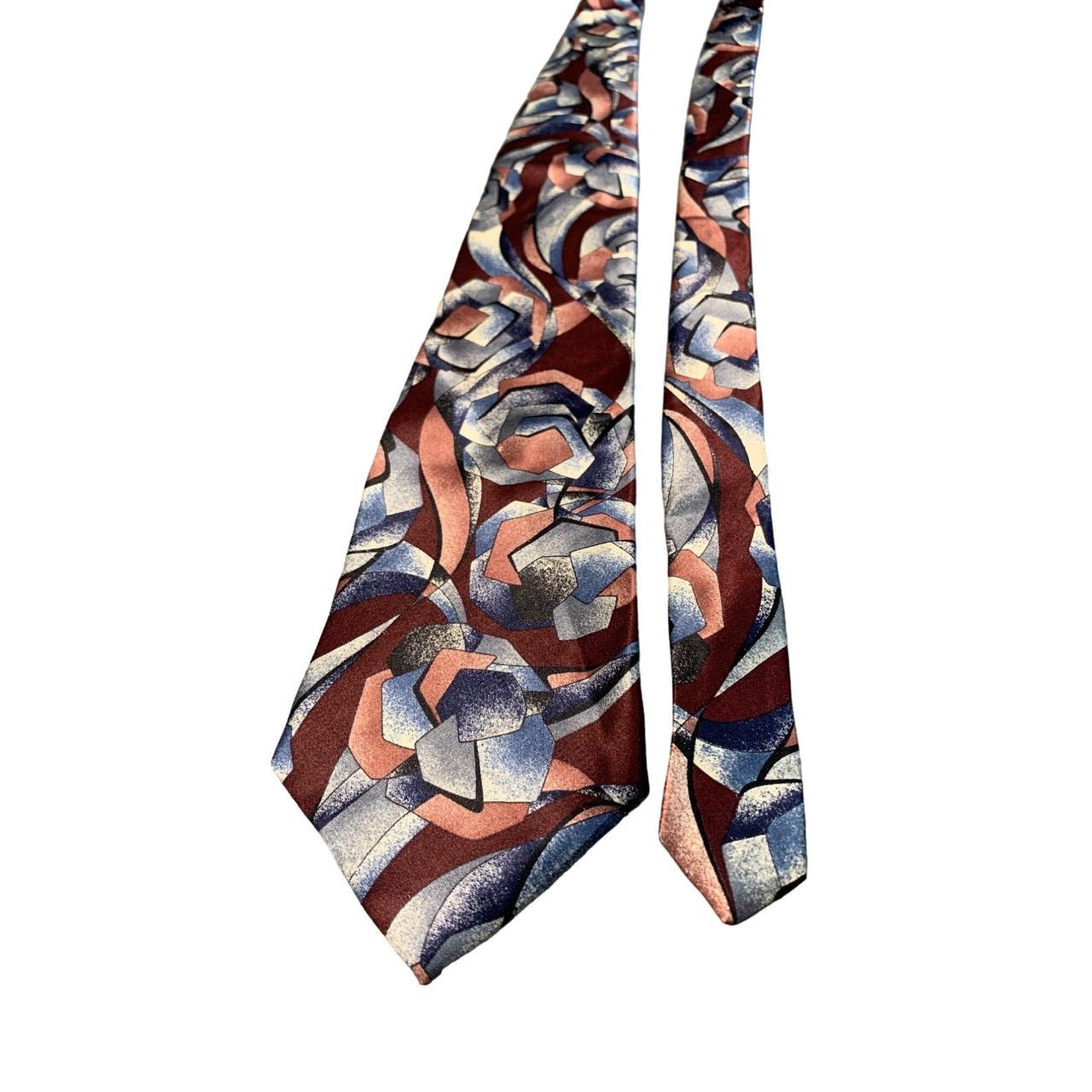 This Halston III men's silk tie, featuring a... | Depop