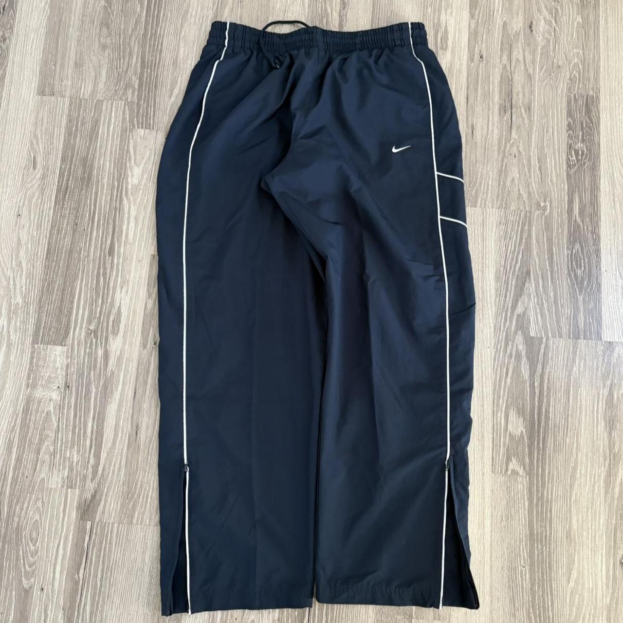 Vintage Nike navy blue track pants with a Y2K style.... | Depop