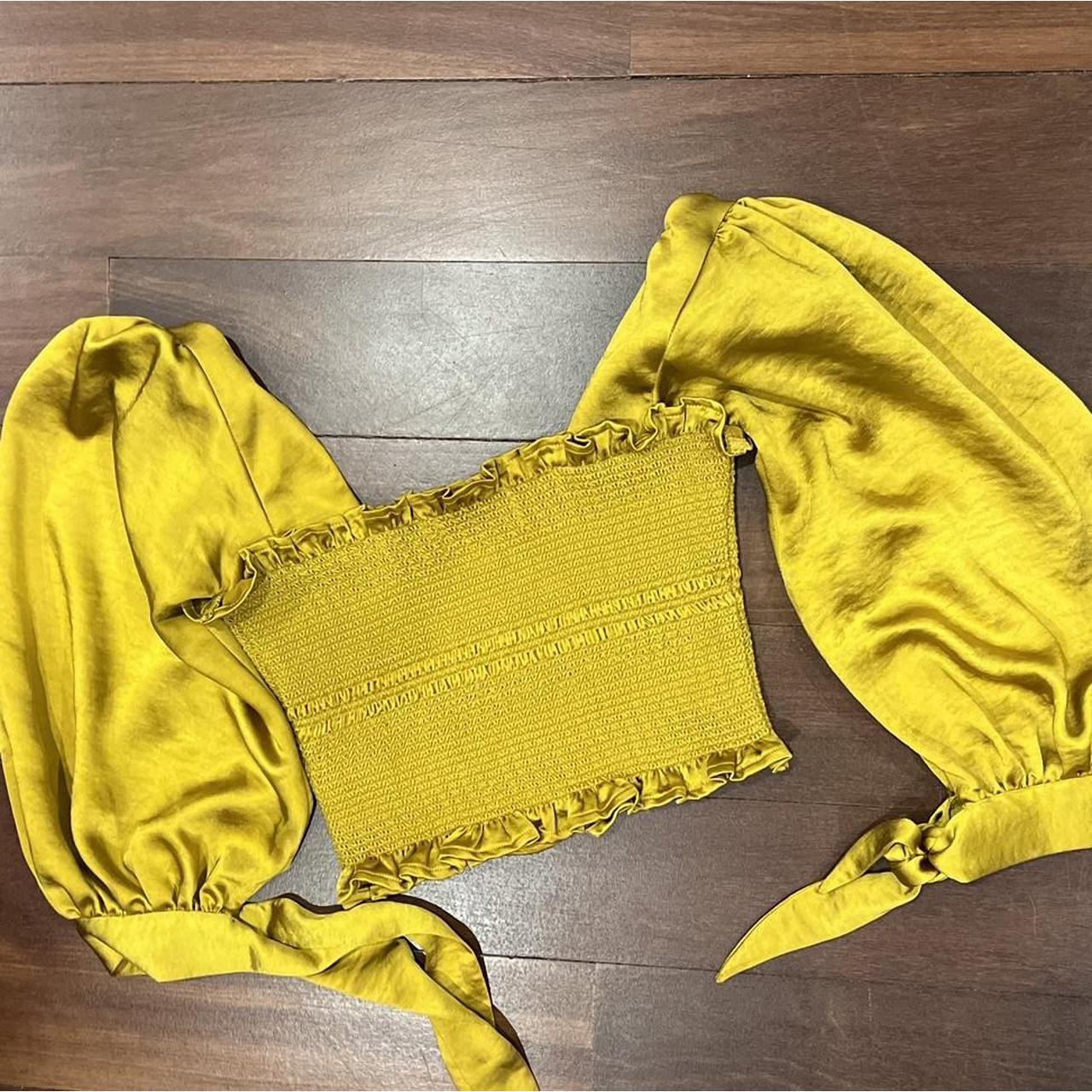 gold ruched top, poofy sleeves, ties best fit sz... - Depop
