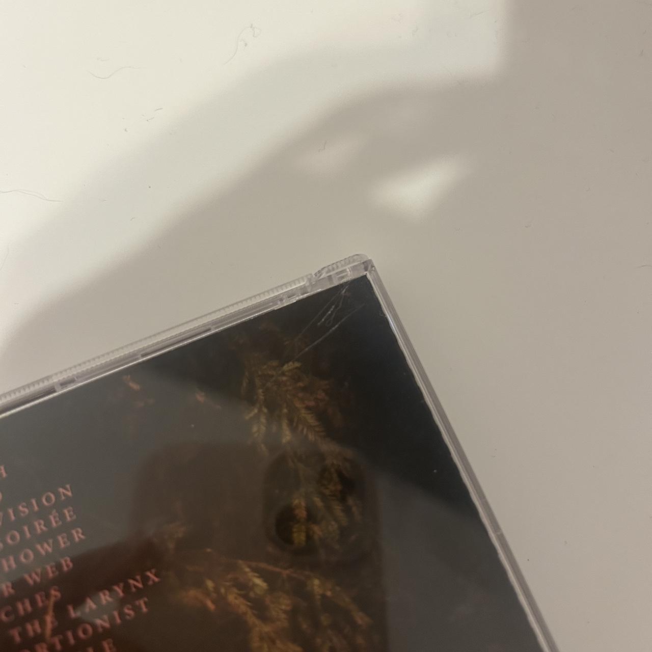 Portals CD, corner slightly scratched but otherwise... - Depop