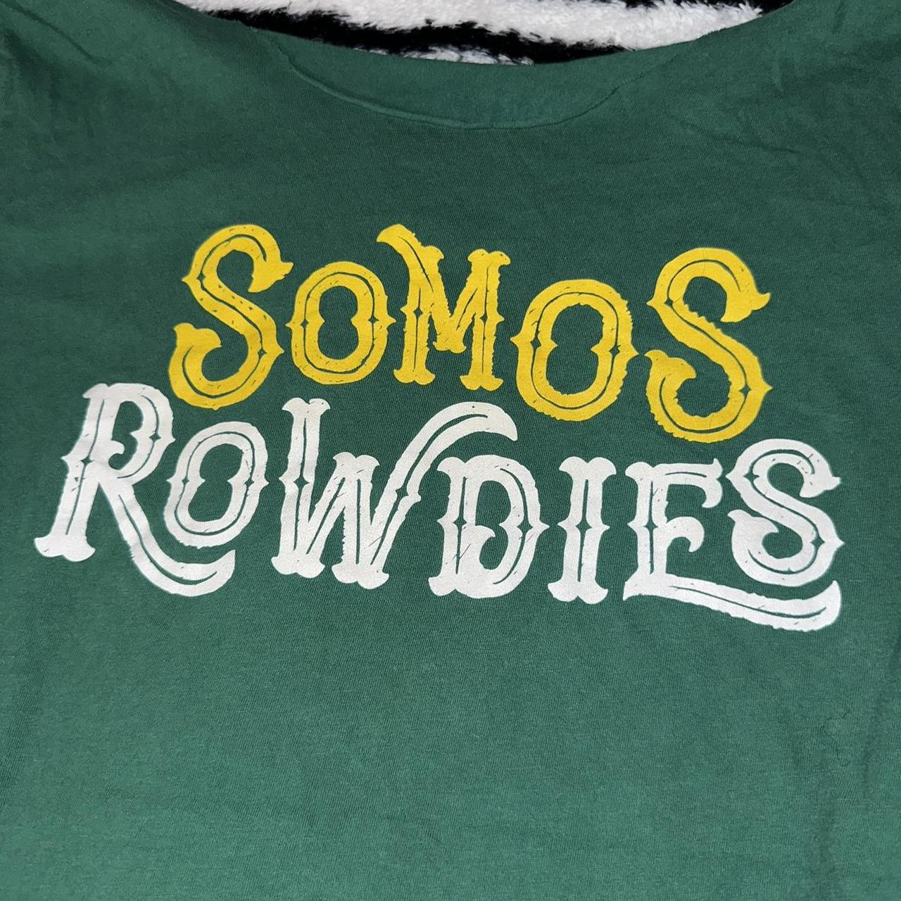 puma green and yellow Somos Rowdies shirt, with a... | Depop