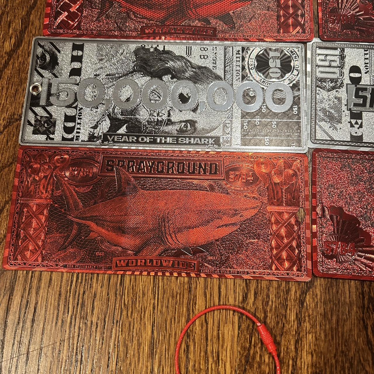 Sprayground Year of the Shark silver and red tag... | Depop