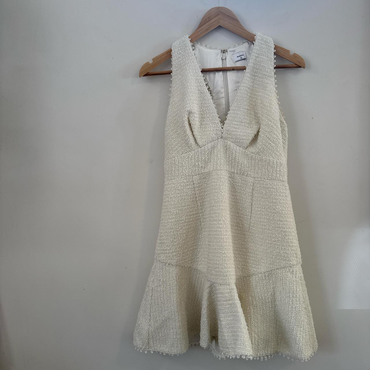 Cream mini dress, textured fabric detailing, peplum... | Depop