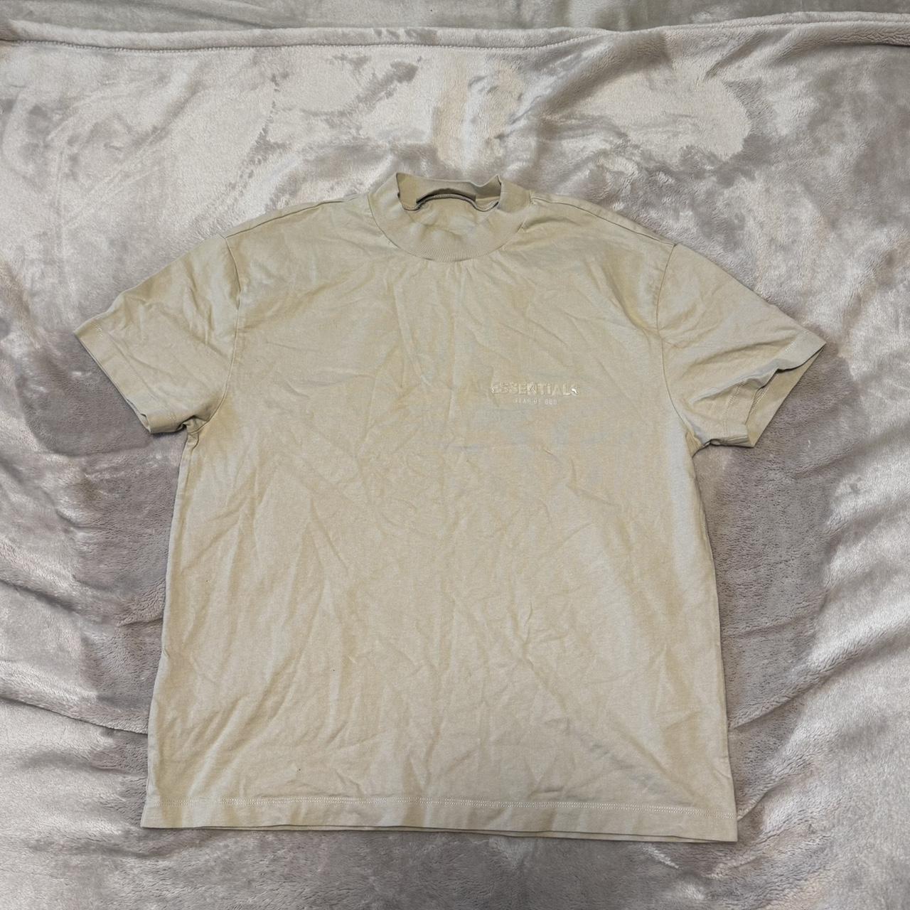 Cream Essential t shirt. *Letters on front are... - Depop