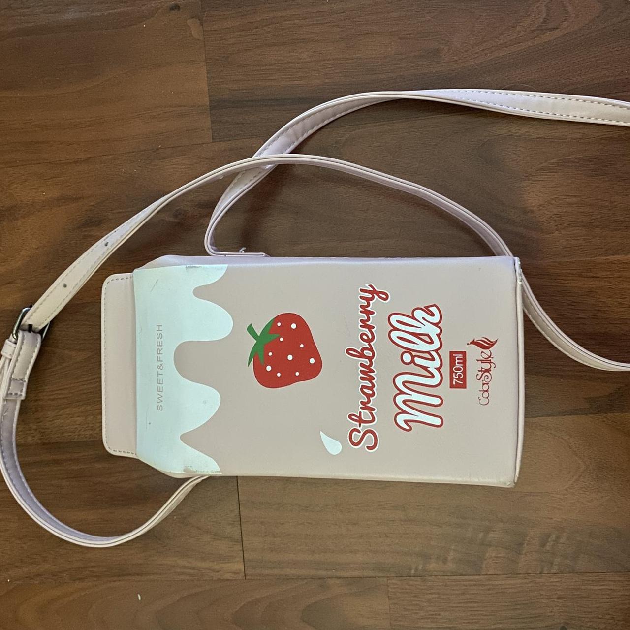 Red strawberry milk purse, has a few marks and used... - Depop
