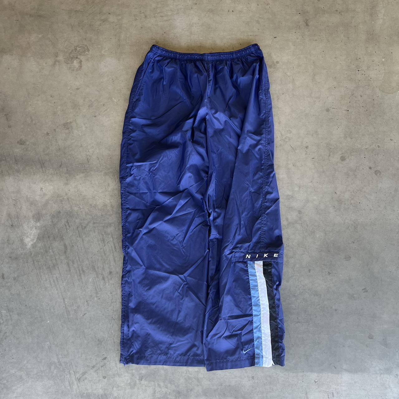 Nike blue baggy parachute track pants Size XL fits... - Depop
