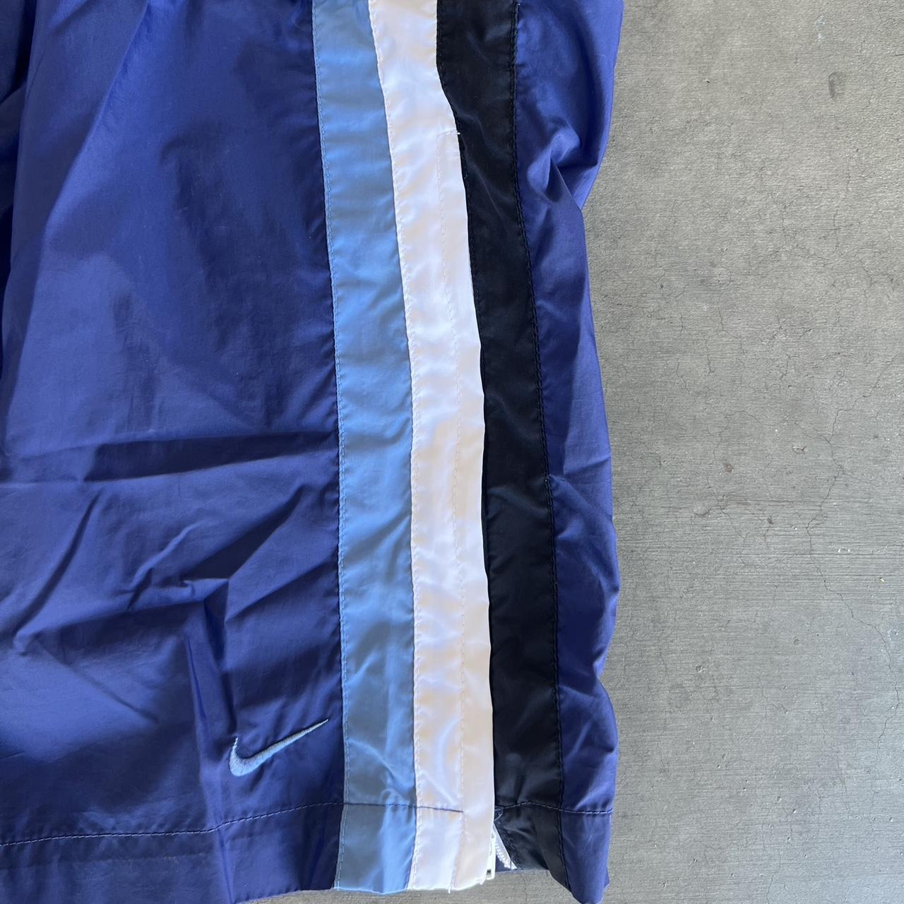 Nike blue baggy parachute track pants Size XL fits... - Depop