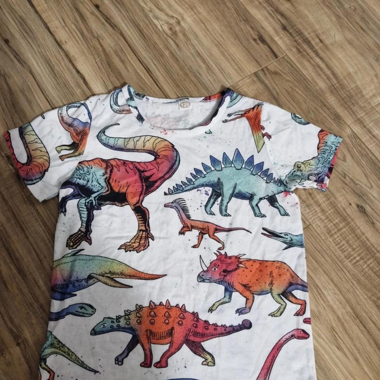Multi-coloured dinosaur print t-shirt... | Depop