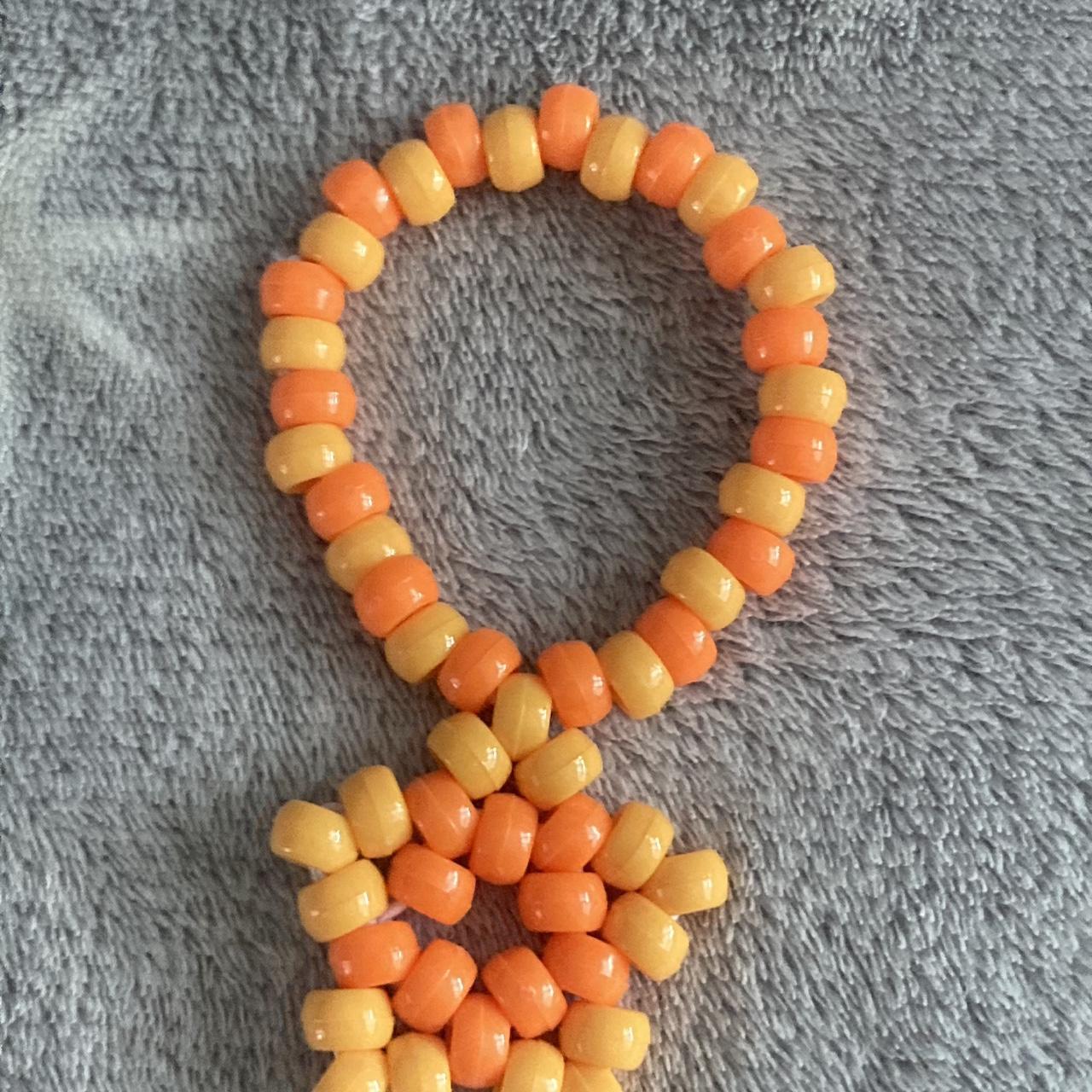 Orange kandi/pony bead star bracelet - Depop