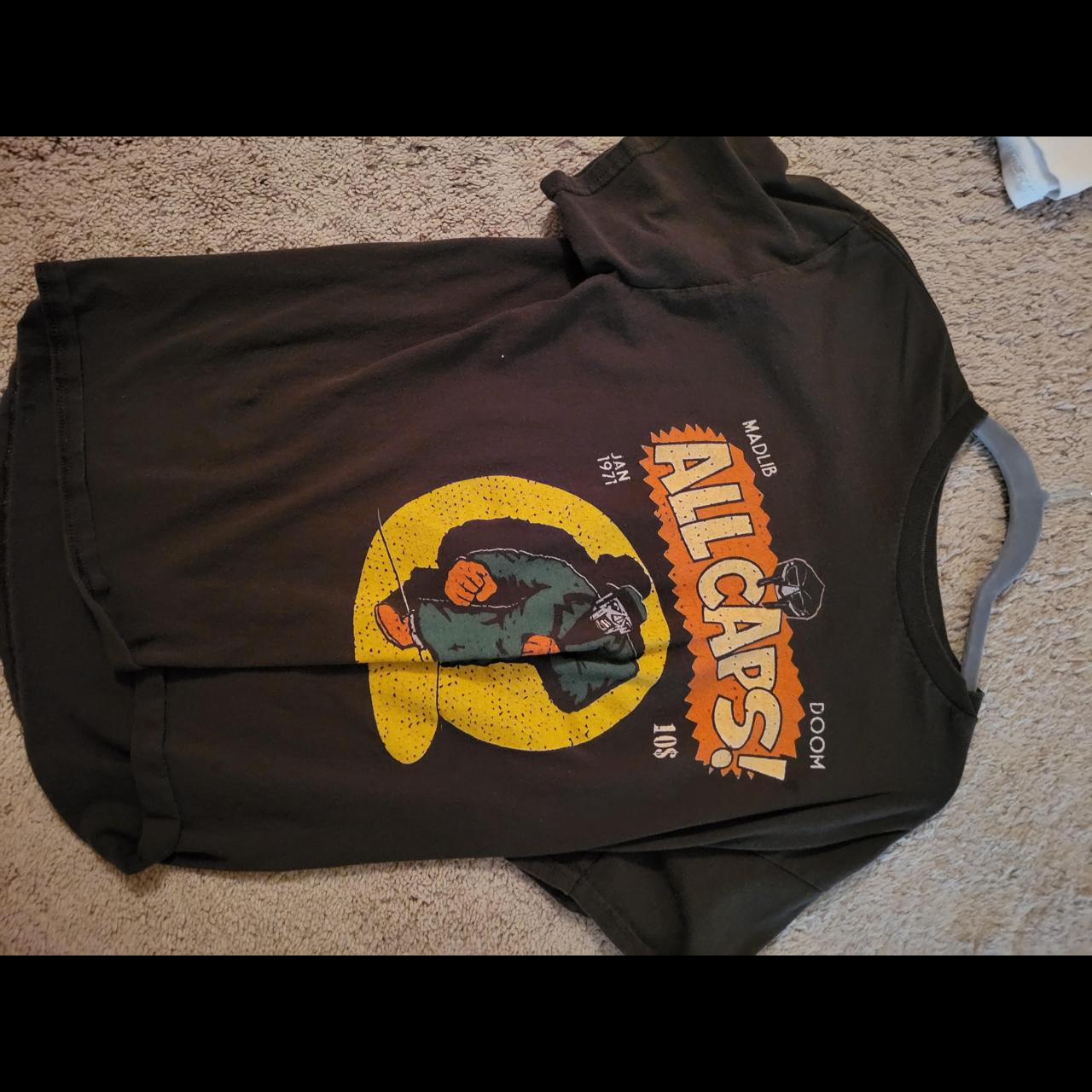 Brown and yellow Doom All Caps shirt #music #mfdoom... | Depop