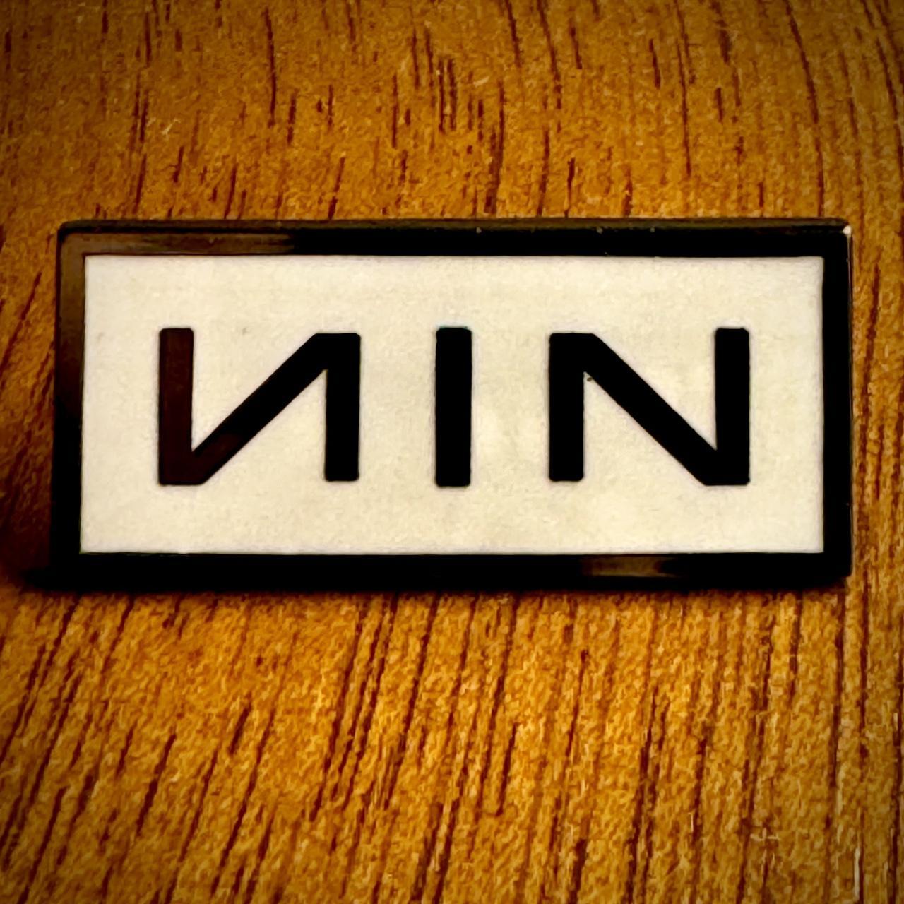 Brand new Nine Inch Nails Pin with rubber backing... - Depop