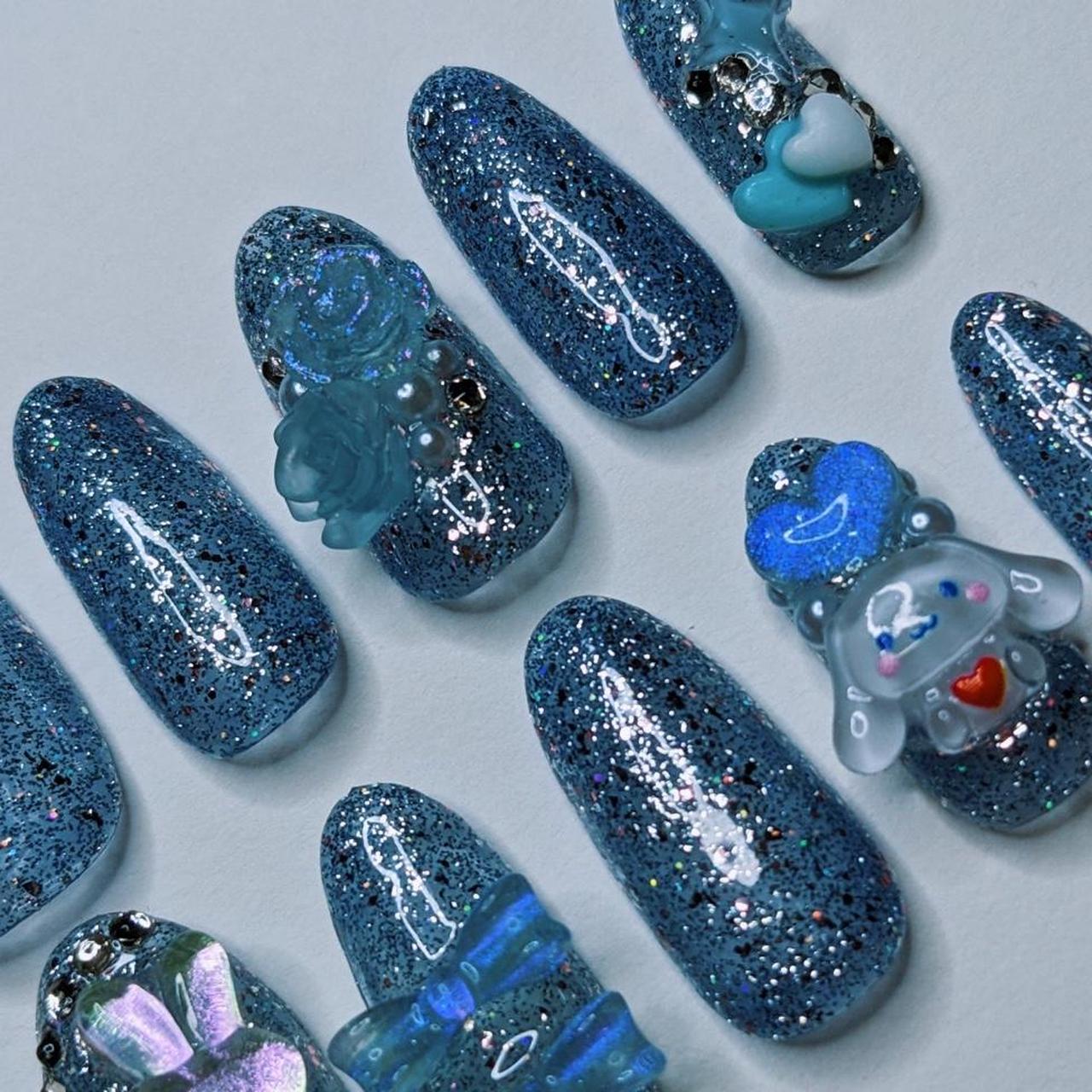 Blue glitter junk nails featuring a cinnamoroll... | Depop
