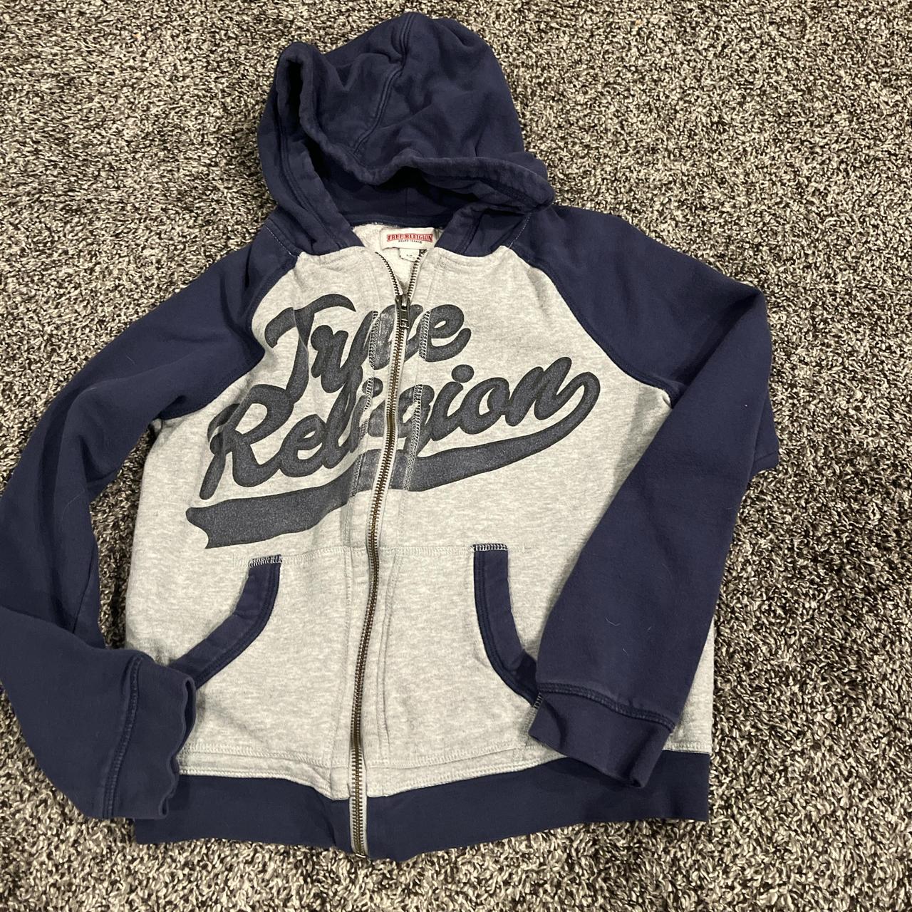 A true religion jacket with zipper. Light fading in... - Depop